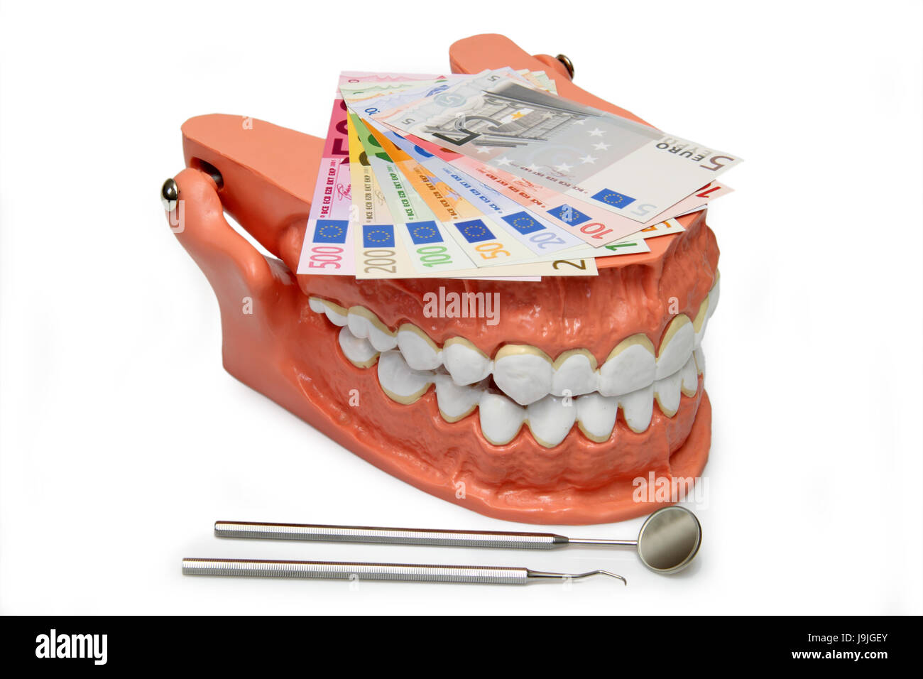 Plastic model of teeth isolated on white background Stock Photo - Alamy