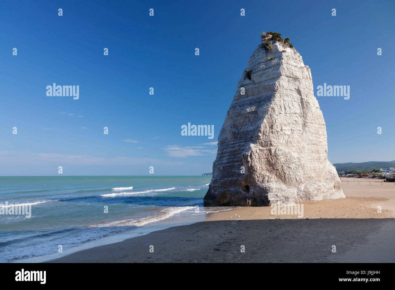 Pizzomunno lime rocks on the beach of Castello, Vieste, Gargano ...