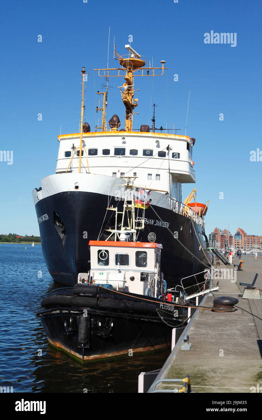 Europe, Germany, Mecklenburg-West Pomerania, Rostock, ship with tugboat ...