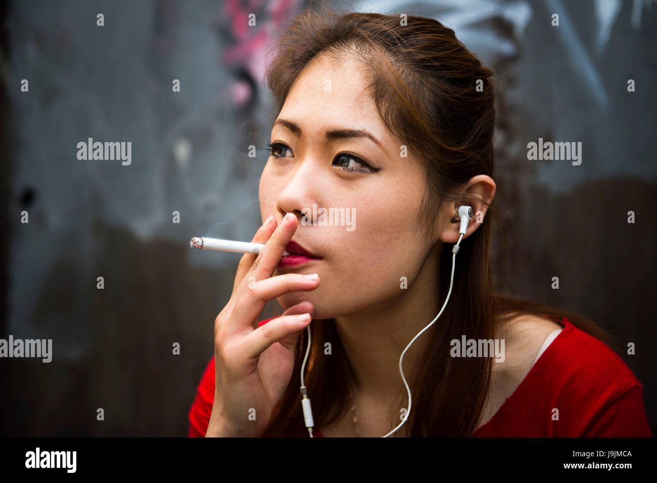 Chinese girl smoking hi-res stock photography and images - Alamy