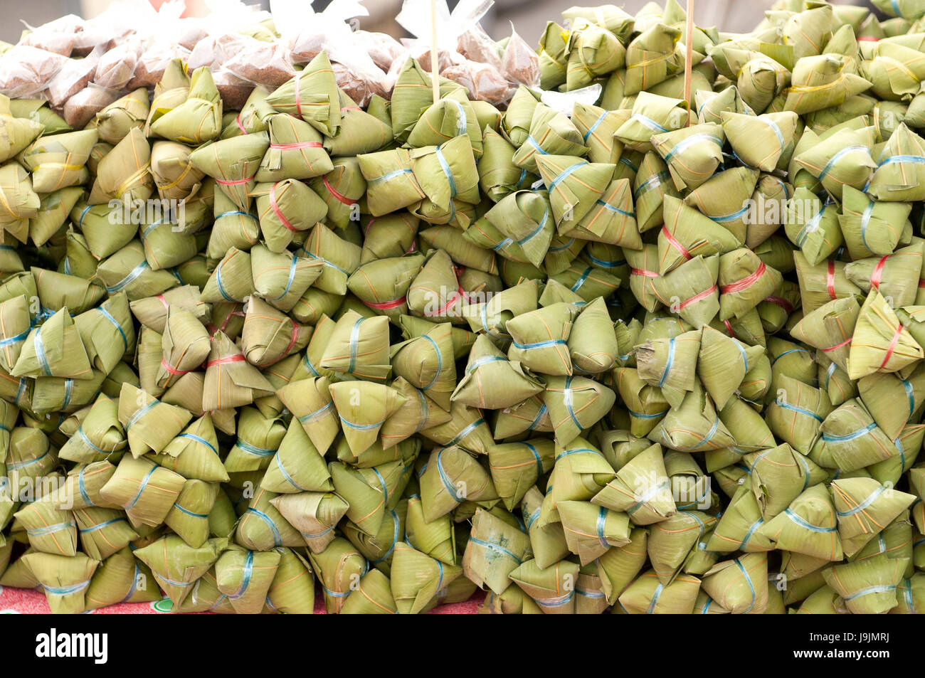Thailand, Food market, Jang, rice in bamboo leaf Stock Photo - Alamy