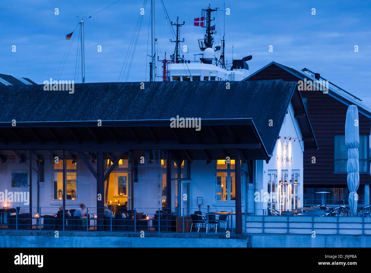 Denmark, Funen, Faaborg, waterfront, port cafe, dusk Stock Photo - Alamy