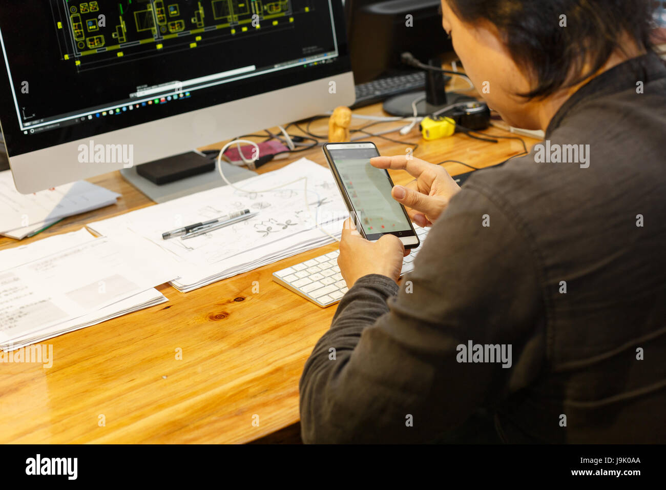 A modern office scene, a man's work scene with a mobile phone Stock ...