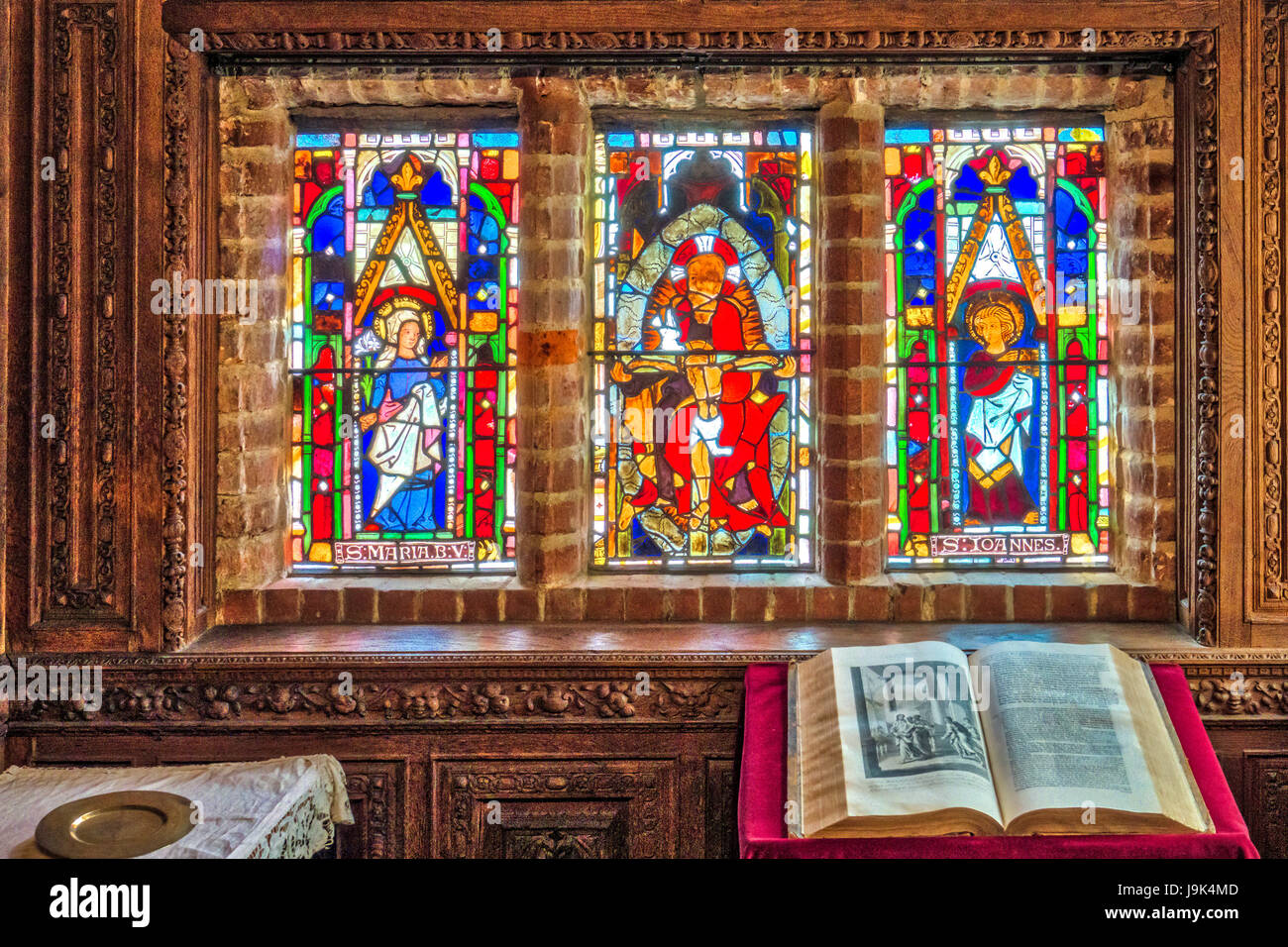 Hever Castle, England - April 2017 : Stained glass windows in a chapel ...