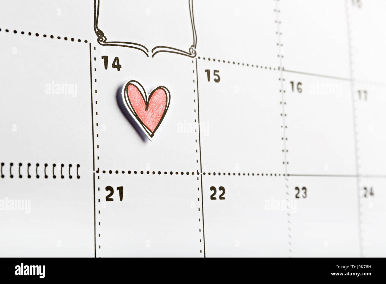 Valentines day marked with red heart in the calendar Stock Photo - Alamy
