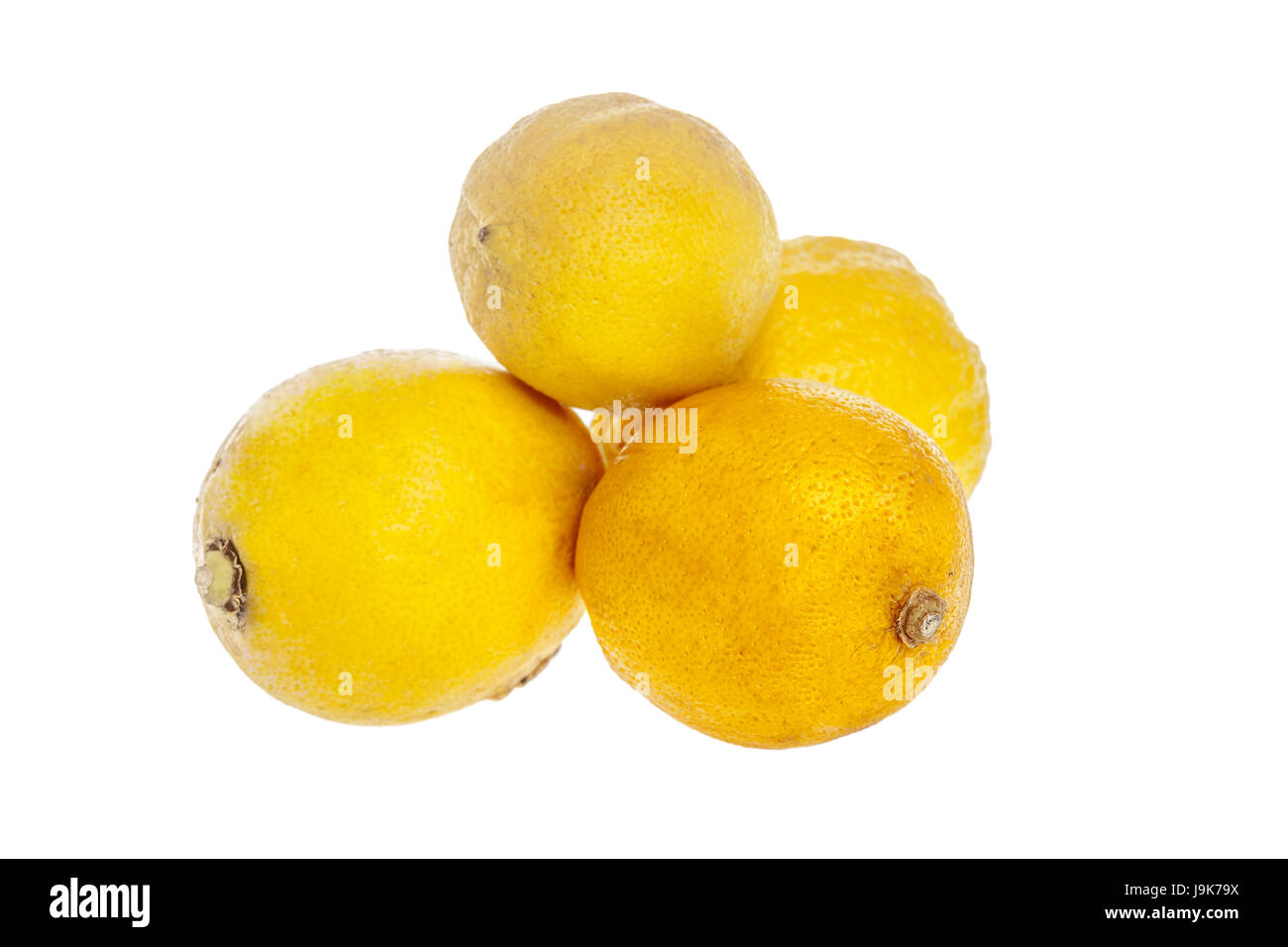 Four natural lemons isolated over white background Stock Photo - Alamy