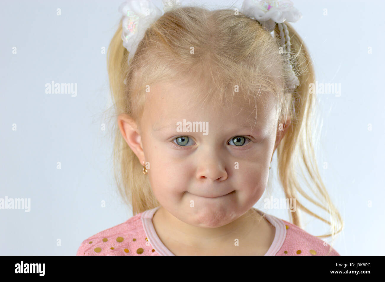 Little shy girl curly hair hi-res stock photography and images - Alamy