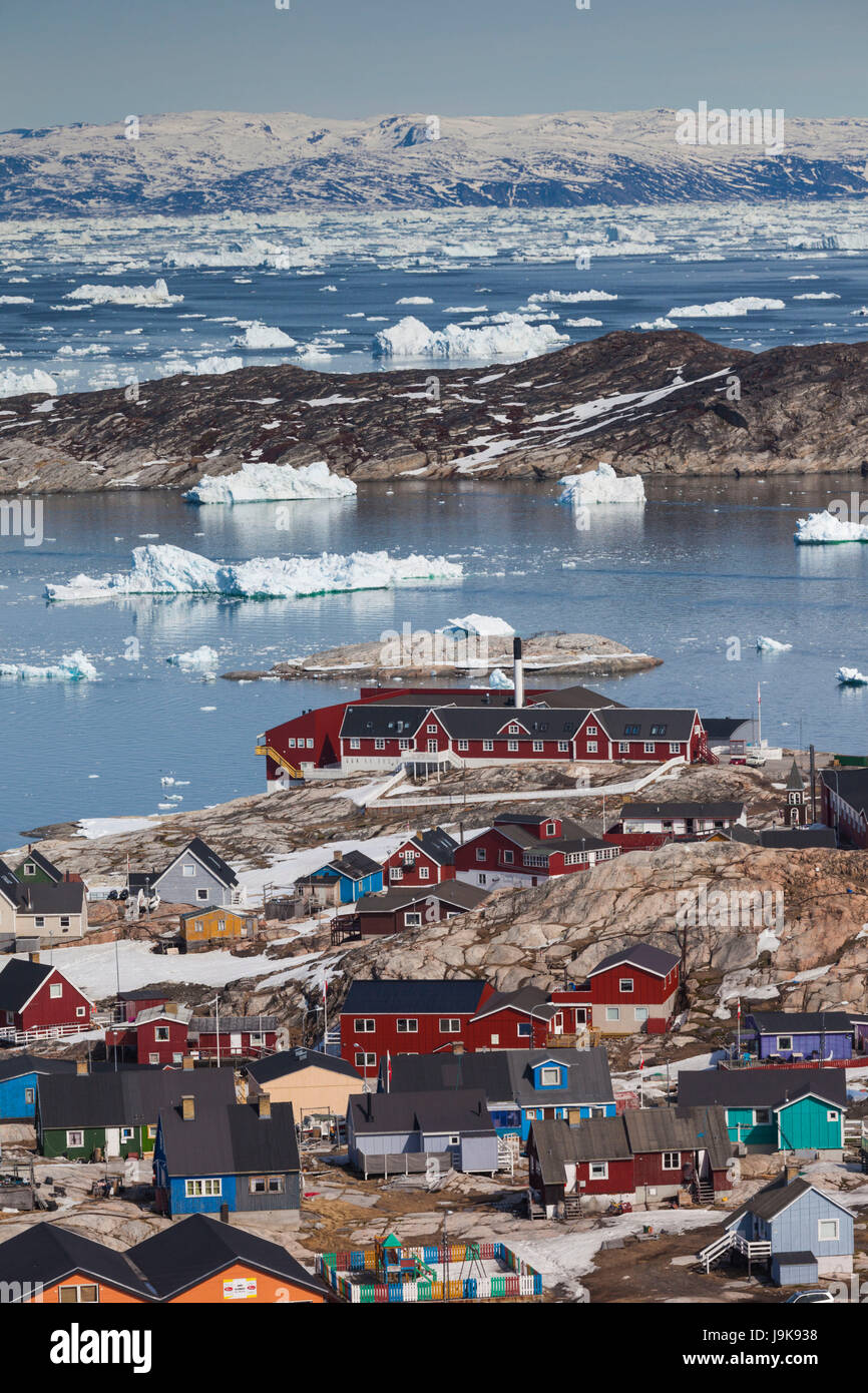 Greenland, Disko Bay, Ilulissat, elevated town view with floating ice ...