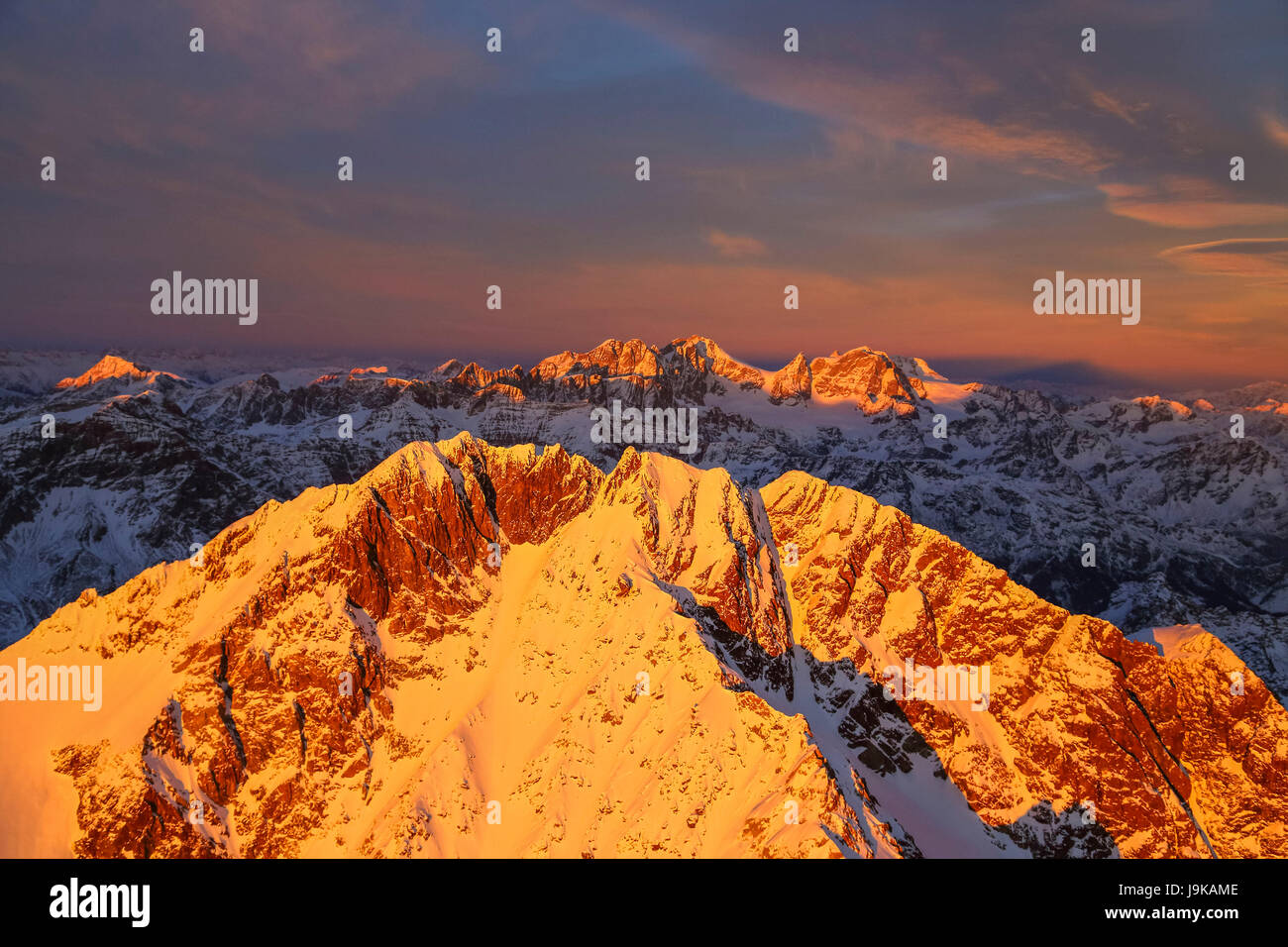 Aerial view of Mount Disgrazia and Bernina Group at sunset Masino ...