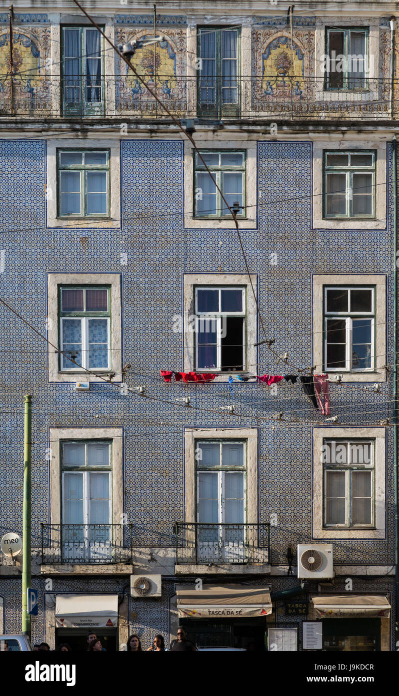 A typical facade of colorful and decorated building of Lisbon Portugal ...