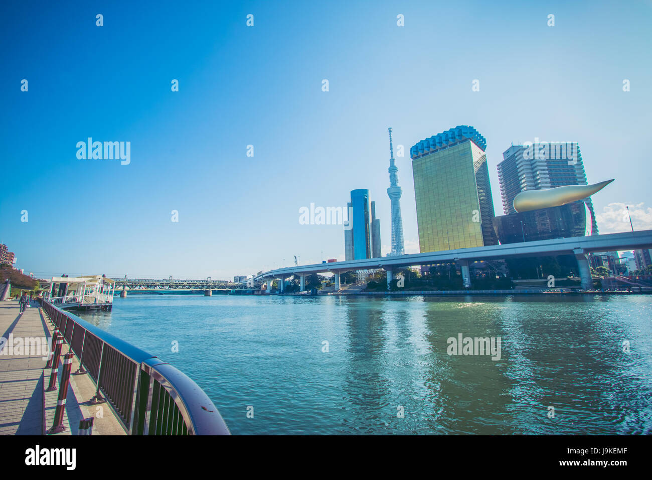 view of Azumabashi Riverside, Red Bridge on the Sumida River,opposite ...