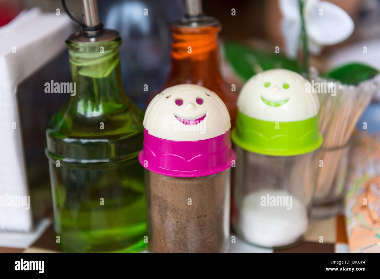 Smiling face on salt and pepper condiments Stock Photo - Alamy