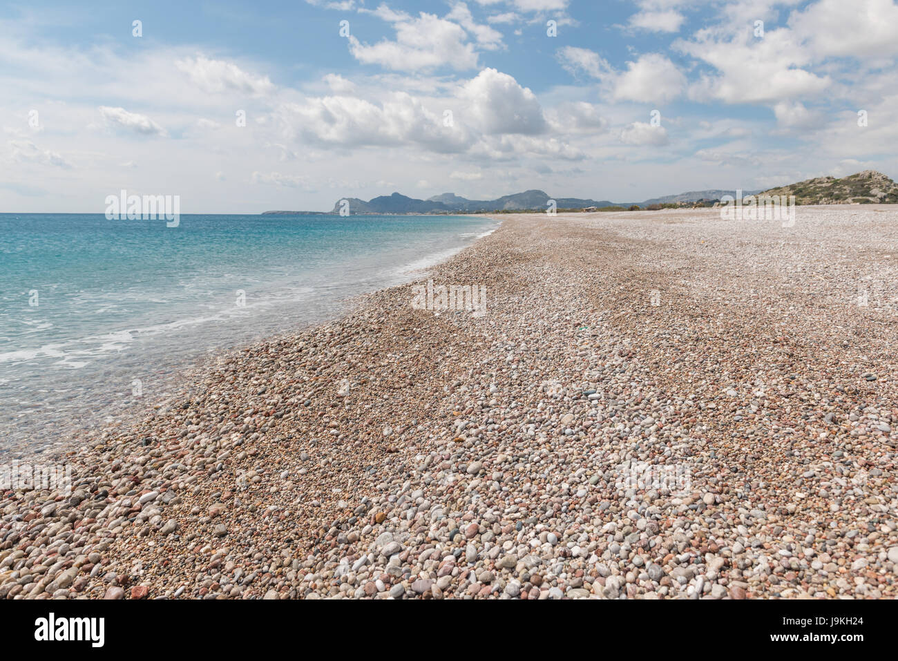 Smooth coloured beach stones and pebbles Stock Photo - Alamy