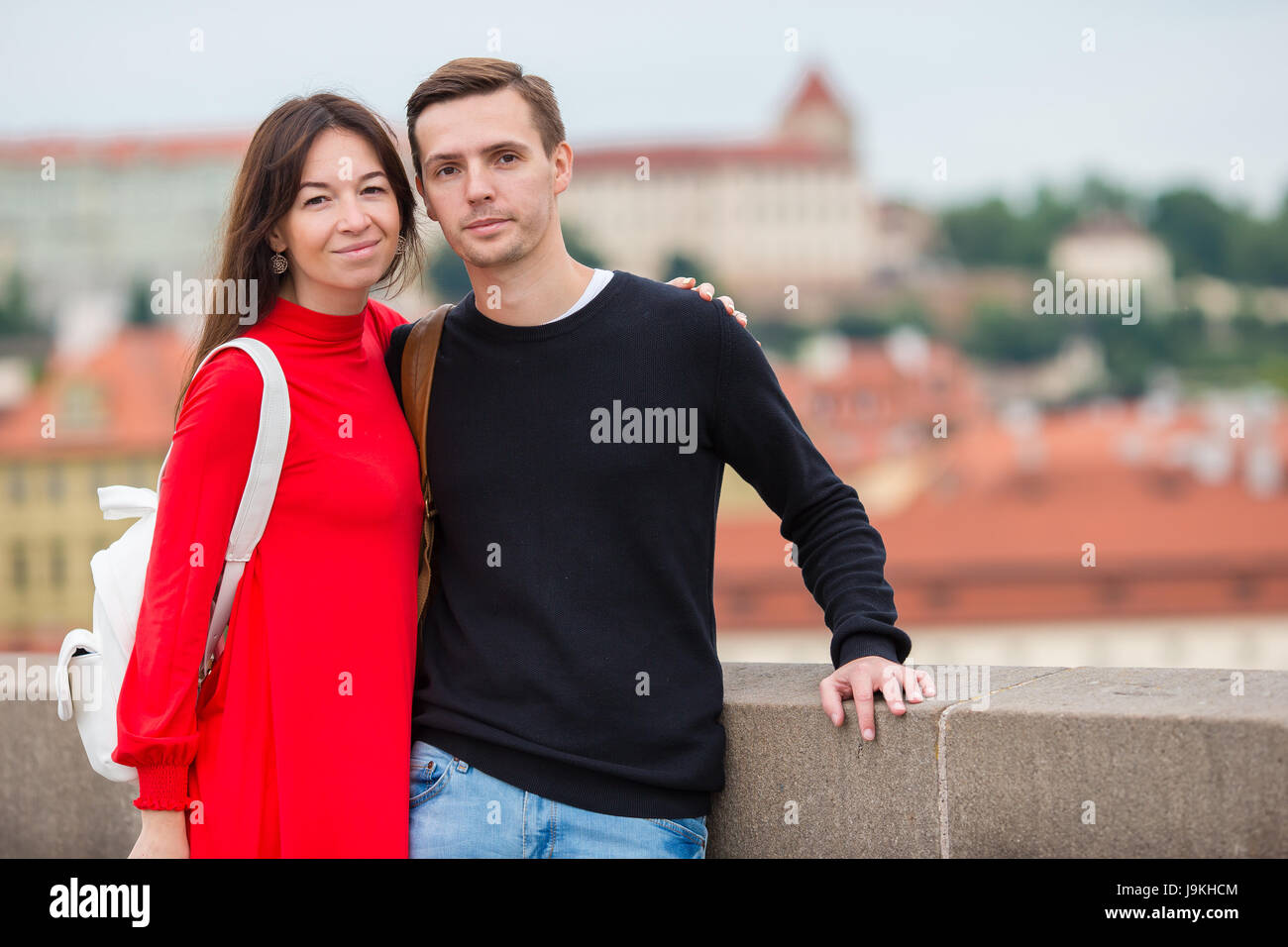 Romantic couple enjoy holidays in Europe. Happy family enjoying ...
