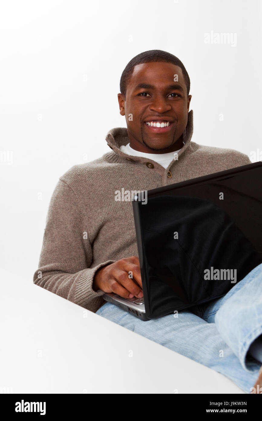African American man working on the computer Stock Photo - Alamy