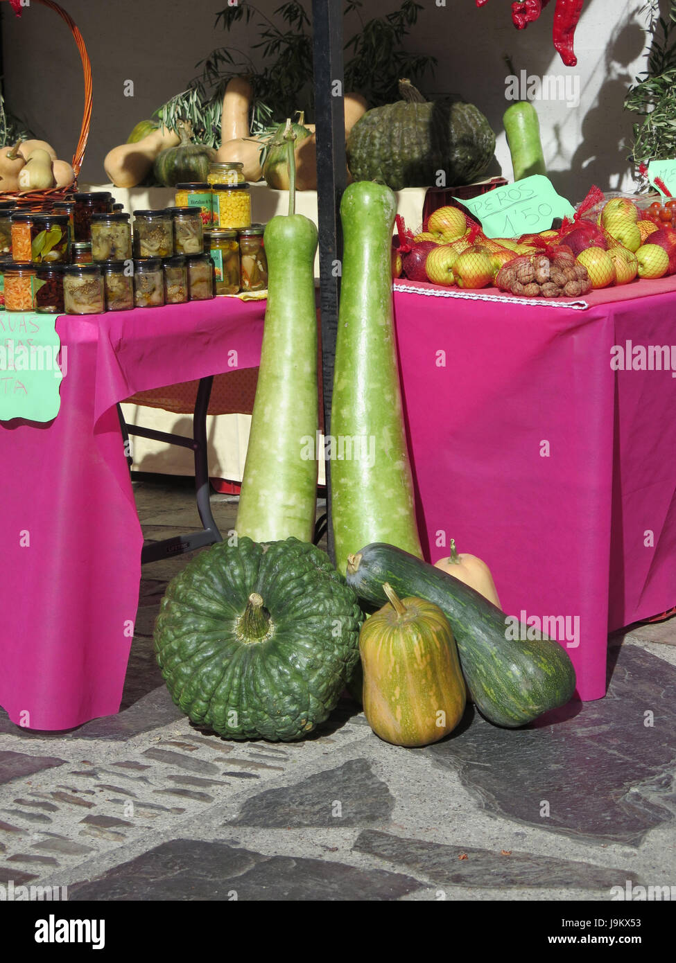 Market stall selling fresh, dried and pickled vegetable goods Stock ...