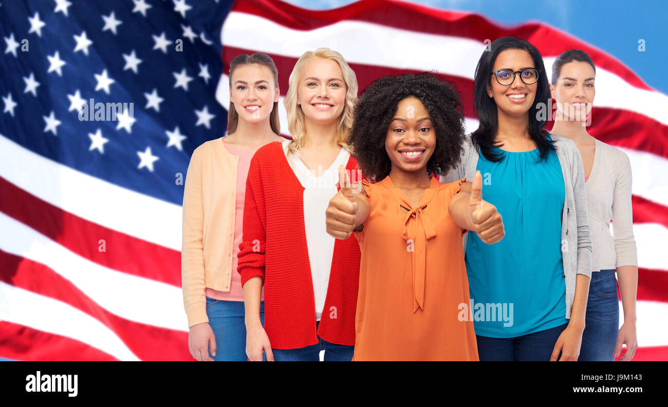 international american women showing thumbs up Stock Photo - Alamy