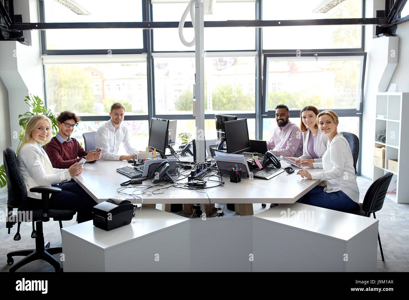 Woman man working together computers hi-res stock photography and ...