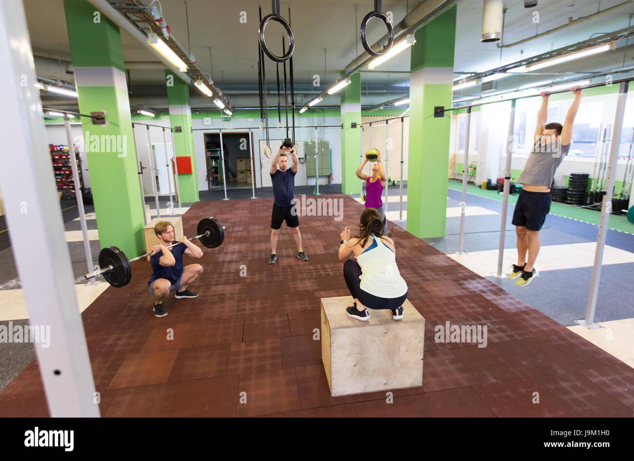 group of people exercising in gym Stock Photo - Alamy