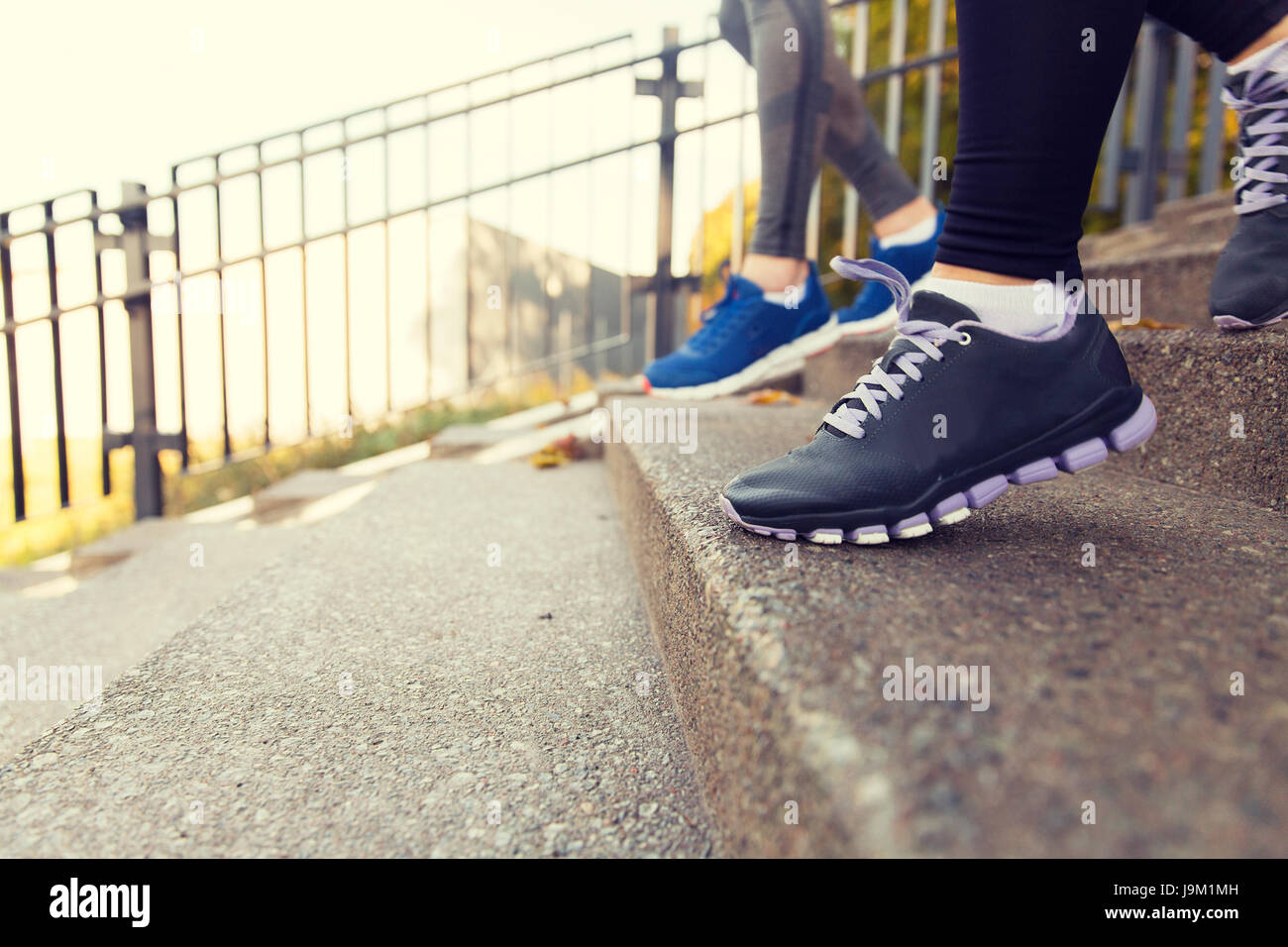 Step woman feet stairs hi-res stock photography and images - Alamy