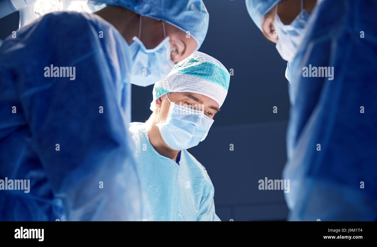 group of surgeons in operating room at hospital Stock Photo - Alamy
