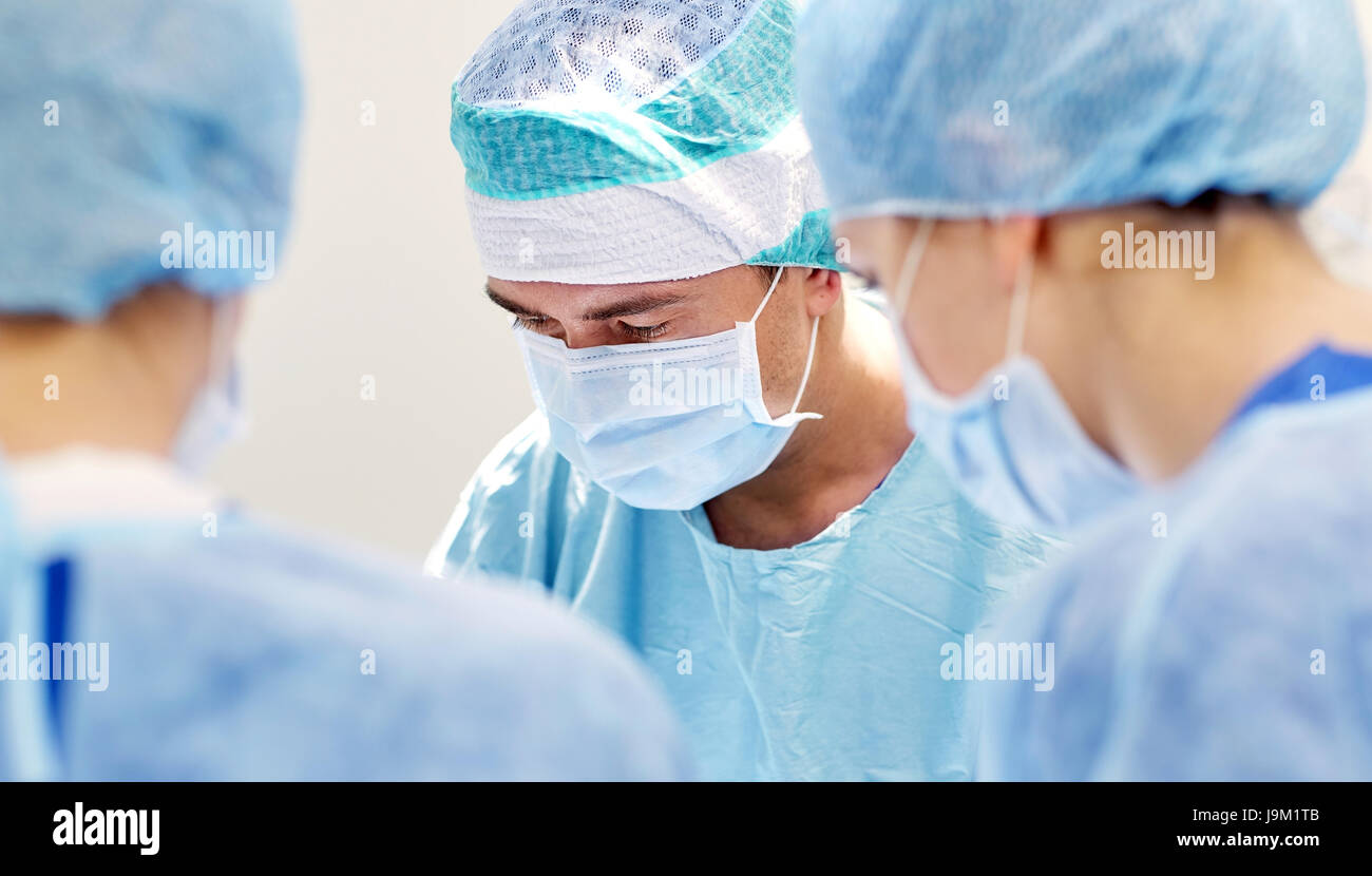 group of surgeons in operating room at hospital Stock Photo - Alamy