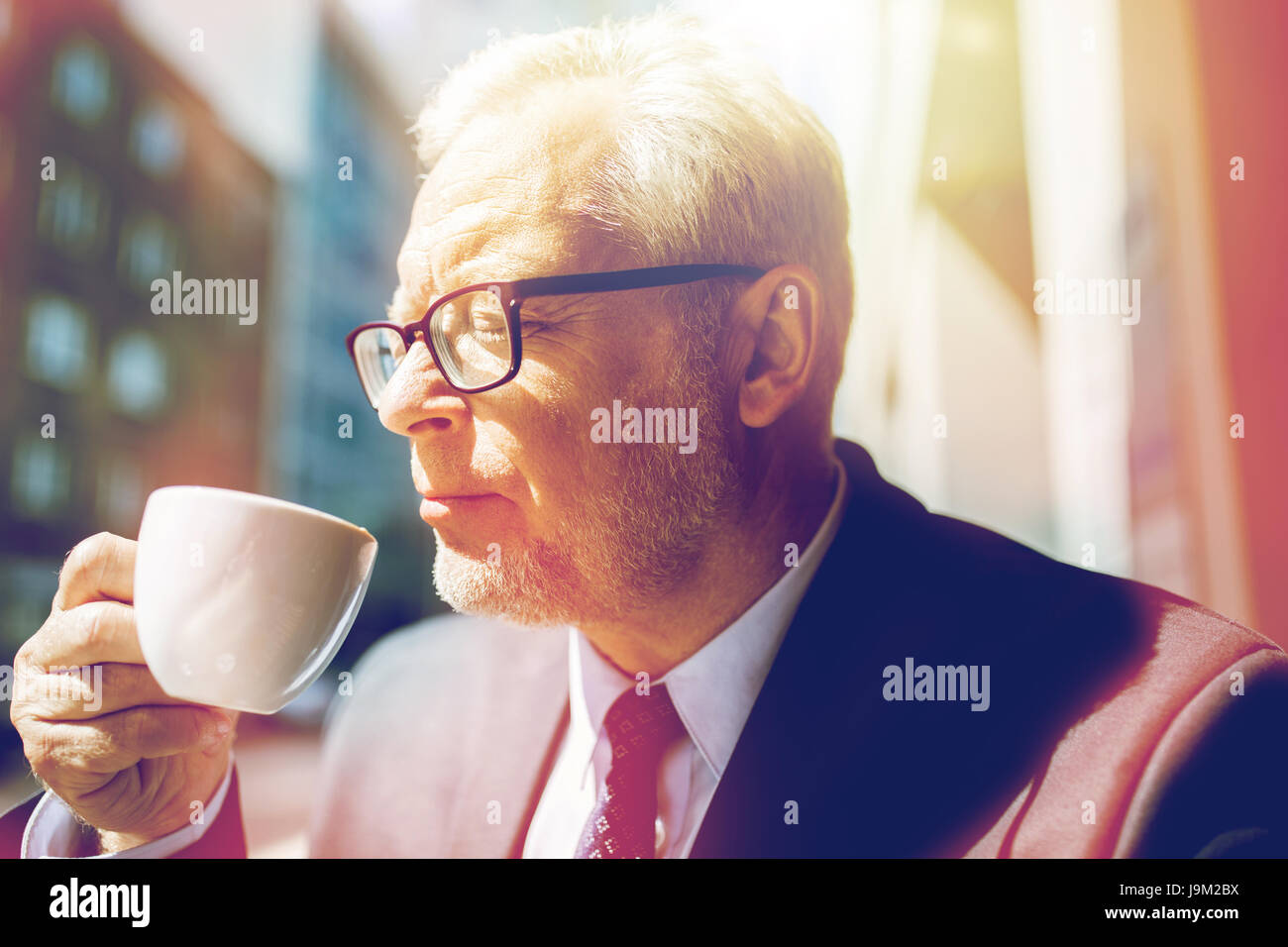 Old man drinking coffee hi-res stock photography and images - Alamy