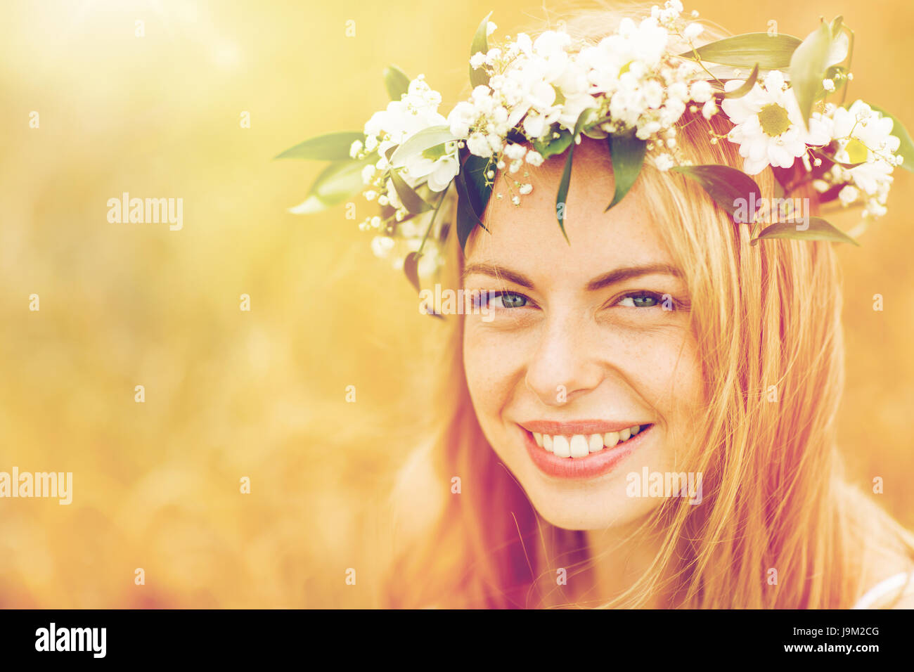 Woman nature smiling flowers hi-res stock photography and images - Alamy