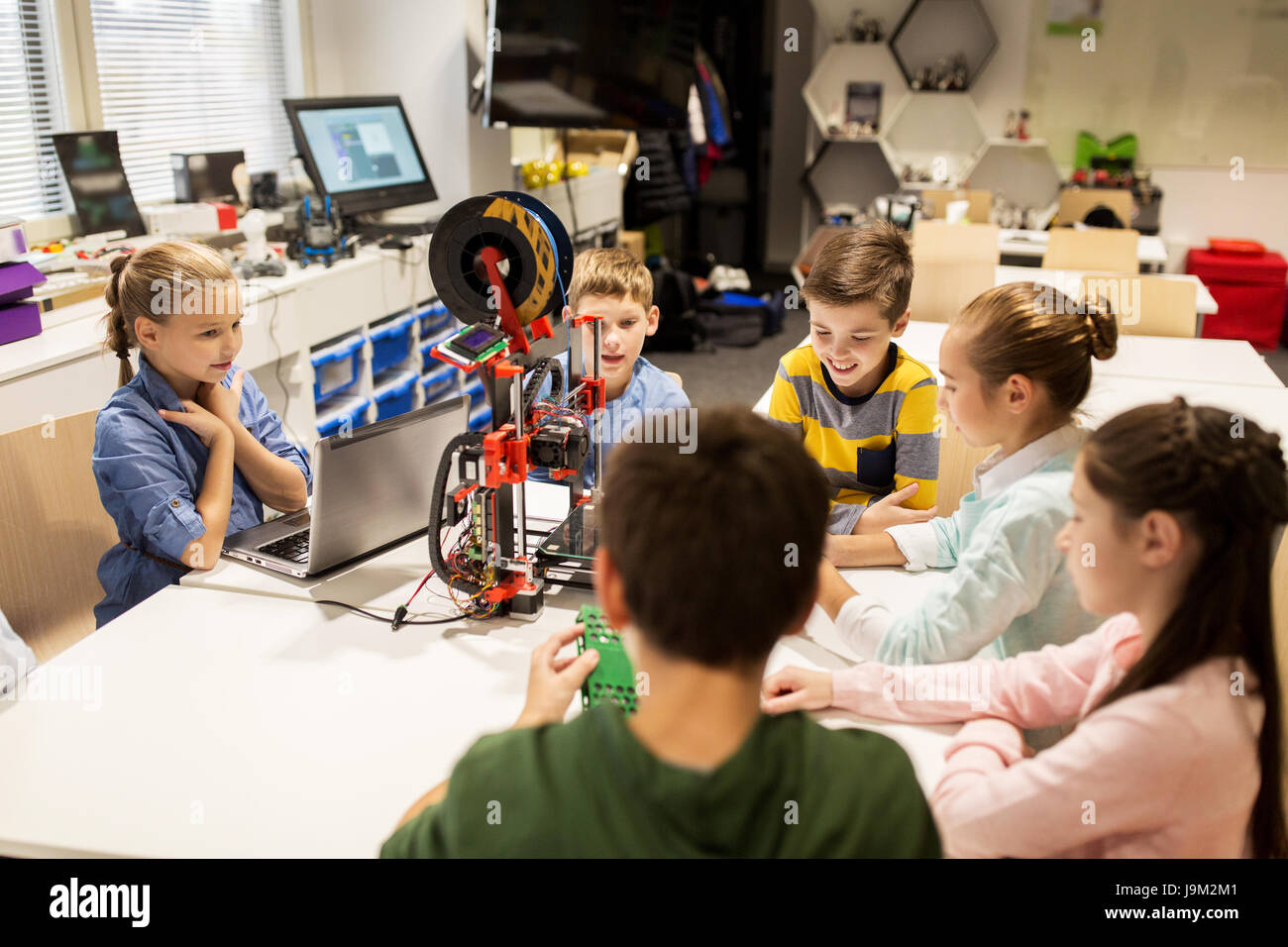 happy children with 3d printer at robotics school Stock Photo - Alamy