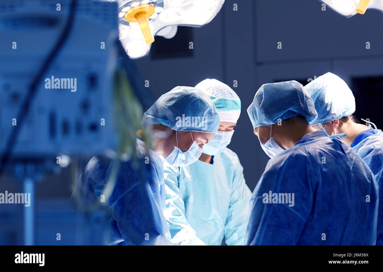group of surgeons in operating room at hospital Stock Photo - Alamy