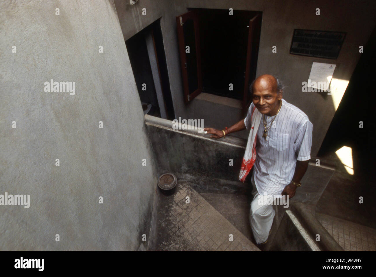 Indian old man climbing stairs hi-res stock photography and images - Alamy