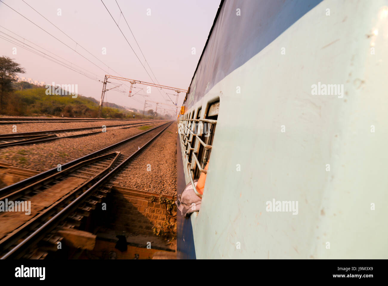 Railway track from the train in movement. India Stock Photo - Alamy