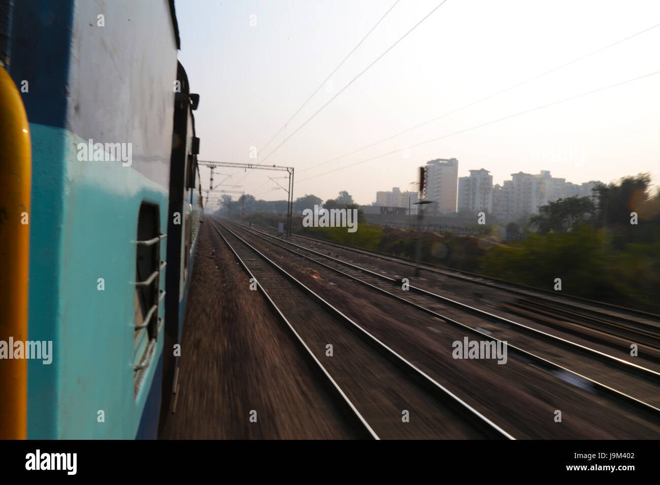 Railway track from the train in movement. India Stock Photo - Alamy
