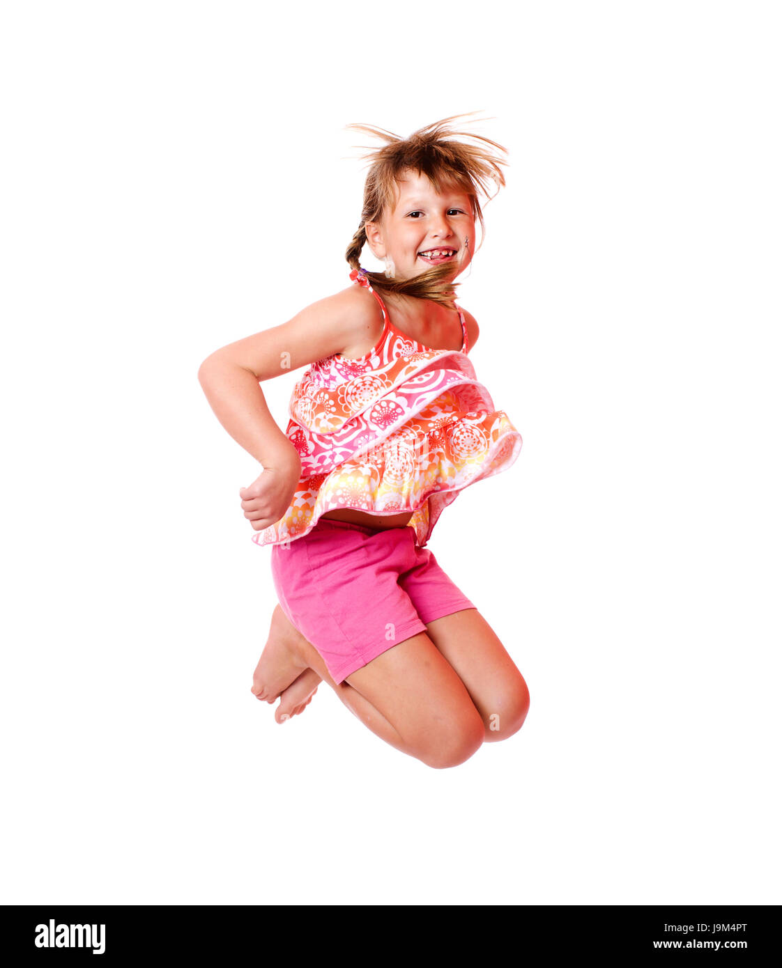 Happy excited Jumping girl isolated on white Stock Photo - Alamy