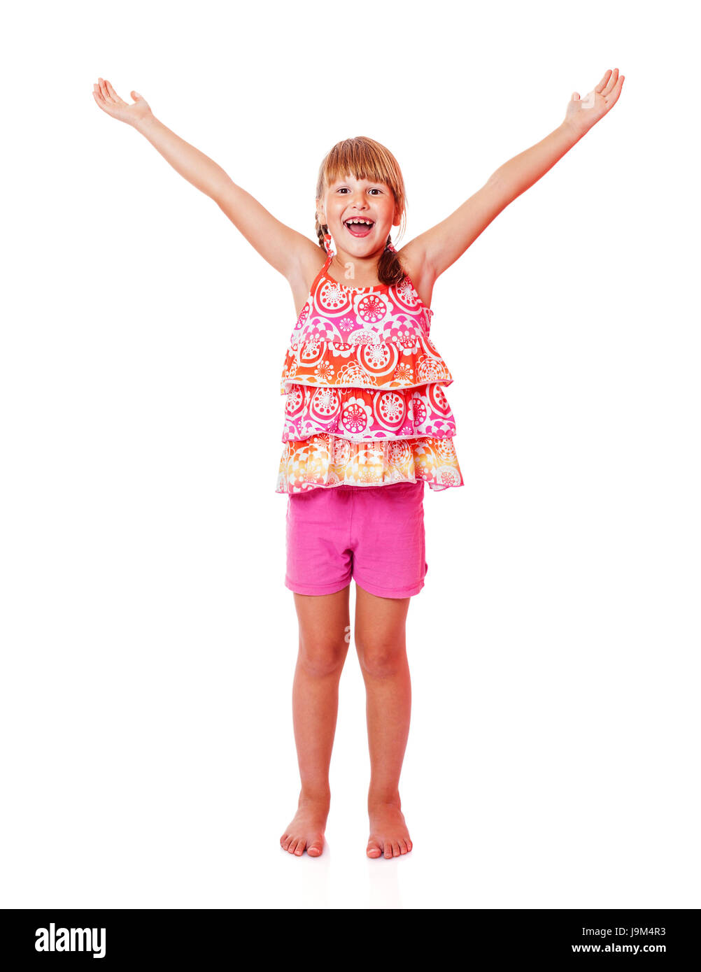 Happy shouting seven years girl standing excited isolated Stock Photo ...
