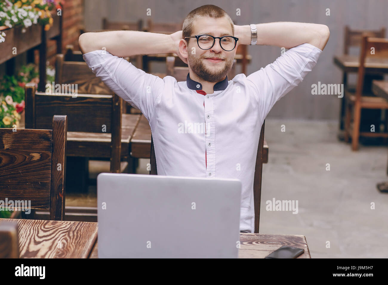 young bank employee busy on a laptop during lunch break Stock Photo - Alamy