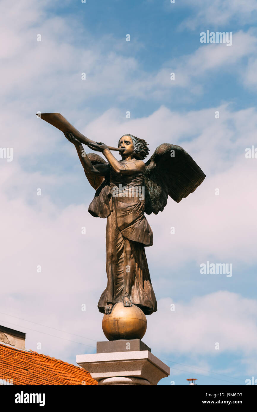 Vilnius, Lithuania. Statue Of An Angel Blowing A Trumpet In Main Square ...