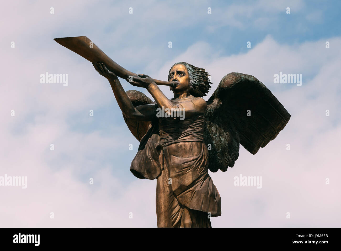 Statue angel blowing trumpet hi-res stock photography and images - Alamy