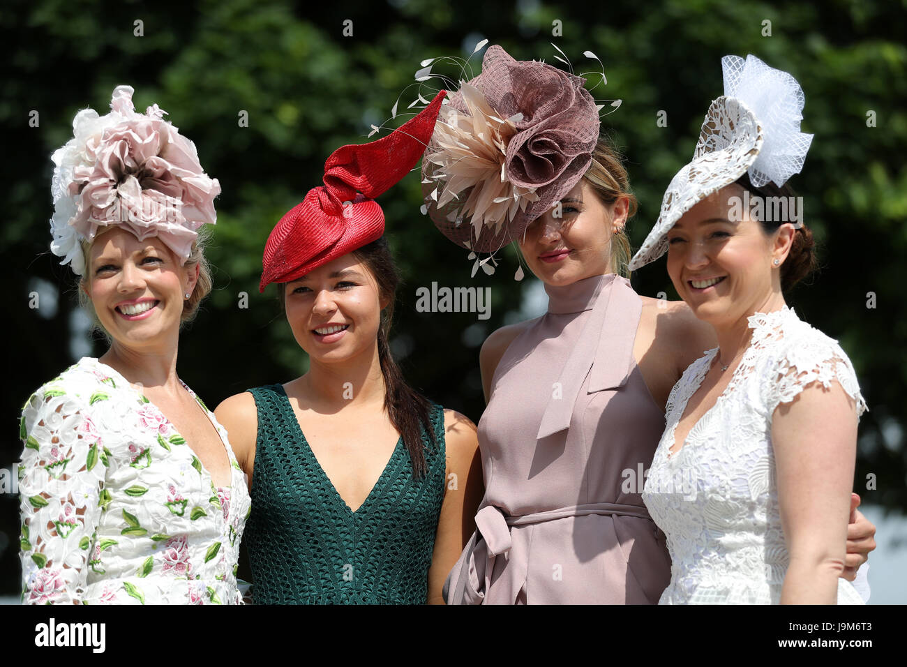 Female racegoers arrive on Ladies Day during the 2017 Investec Epsom ...