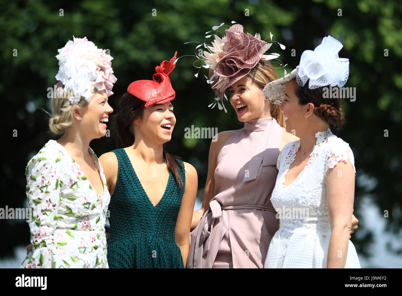 Female racegoers arrive on Ladies Day during the 2017 Investec Epsom ...