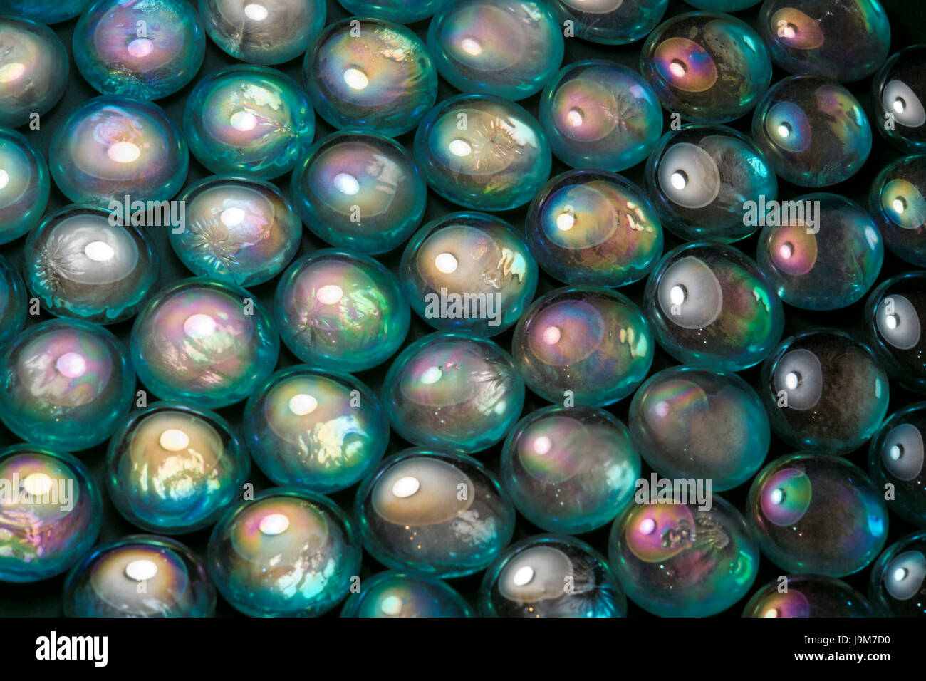iridescent glass beads Stock Photo - Alamy