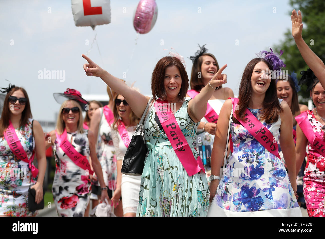 Female racegoers arrive for a hen party on Ladies Day during the 2017 ...