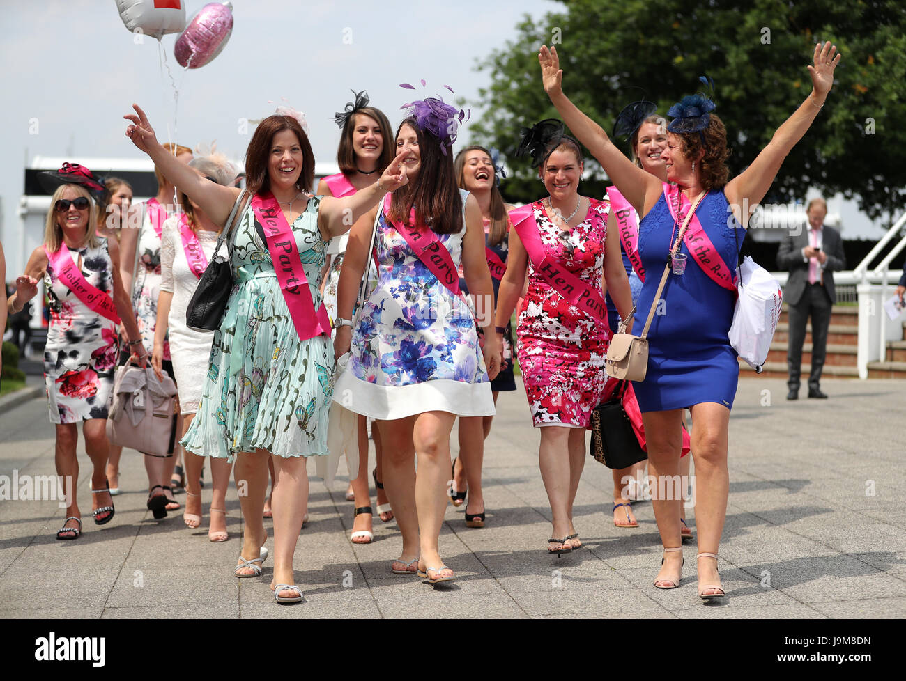 Female racegoers arrive for a hen party on Ladies Day during the 2017 ...