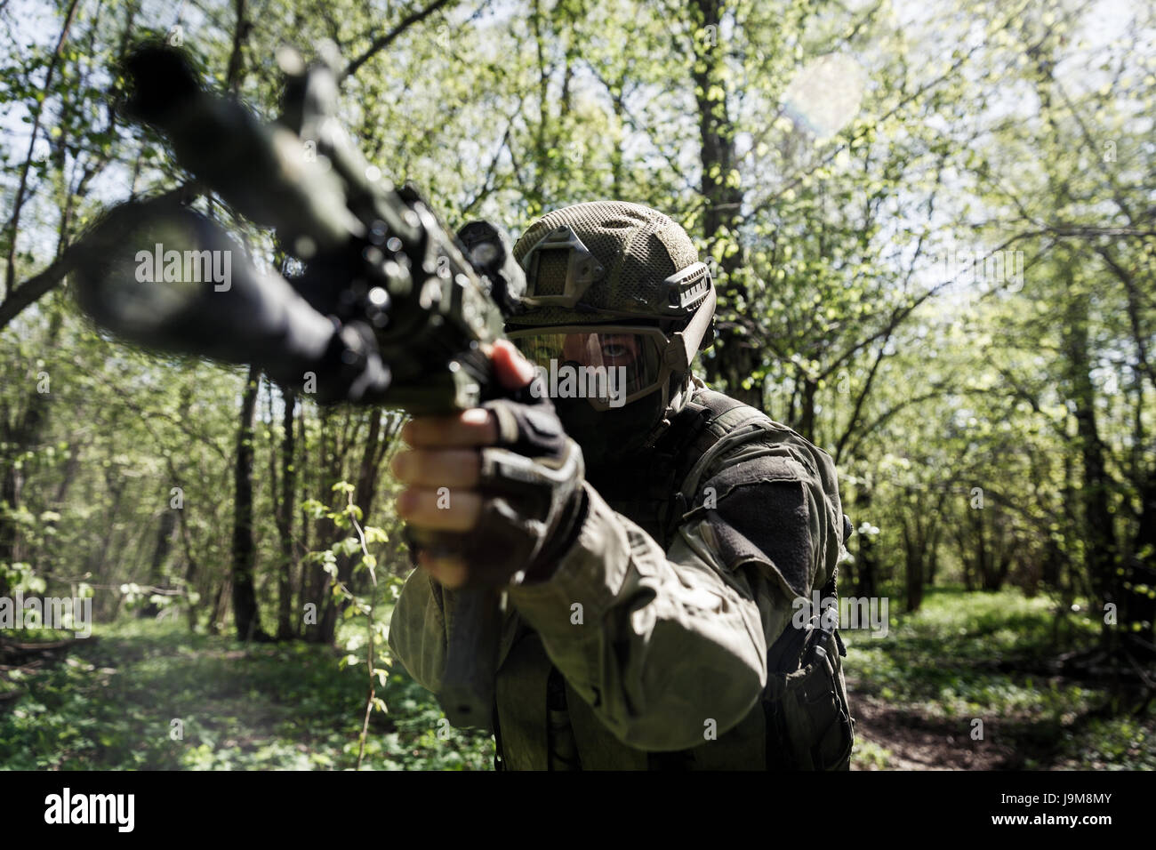 Sniper with aiming submachine gun Stock Photo - Alamy