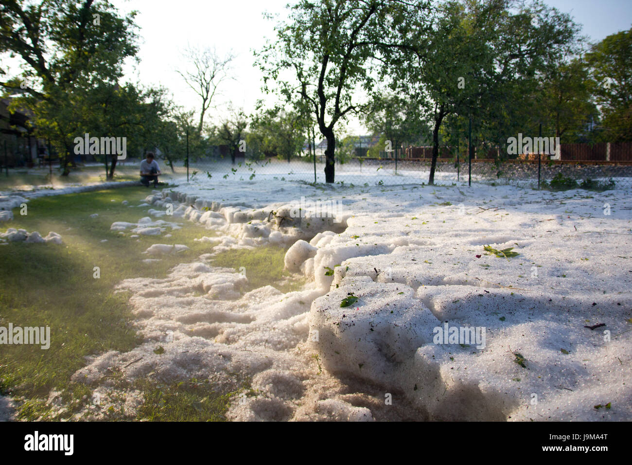 Hand large ball hail hi-res stock photography and images - Alamy