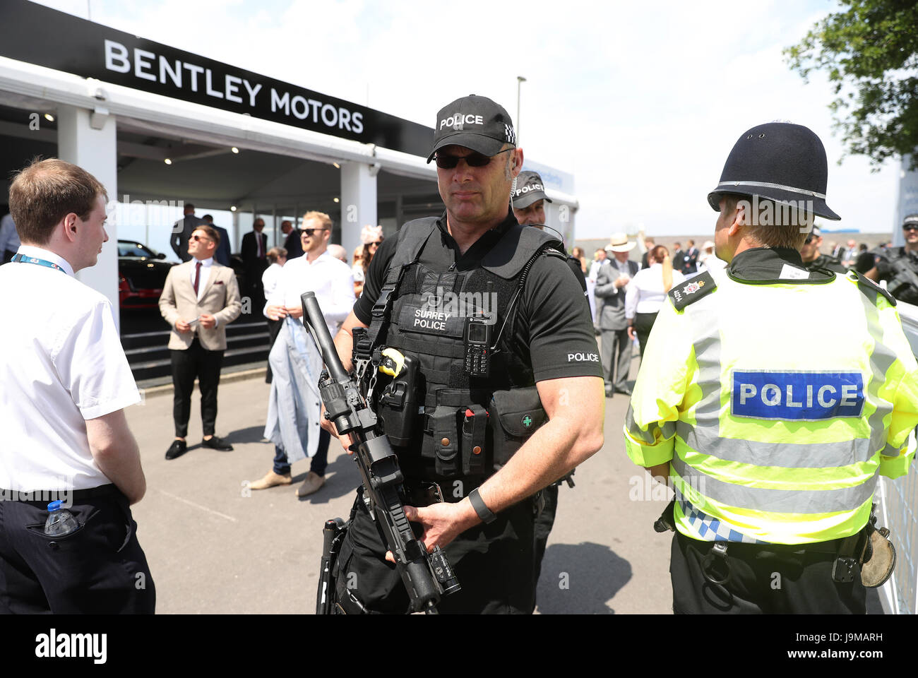 Armed police on patrol on Ladies Day during the 2017 Investec Epsom ...