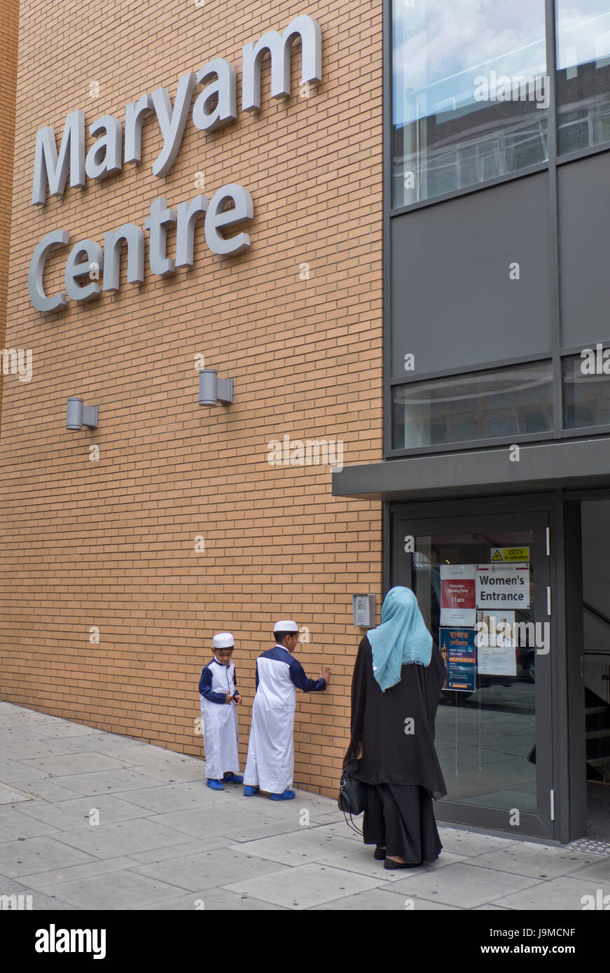 Muslim women and children at Maryam Centre and women's entrance to East ...