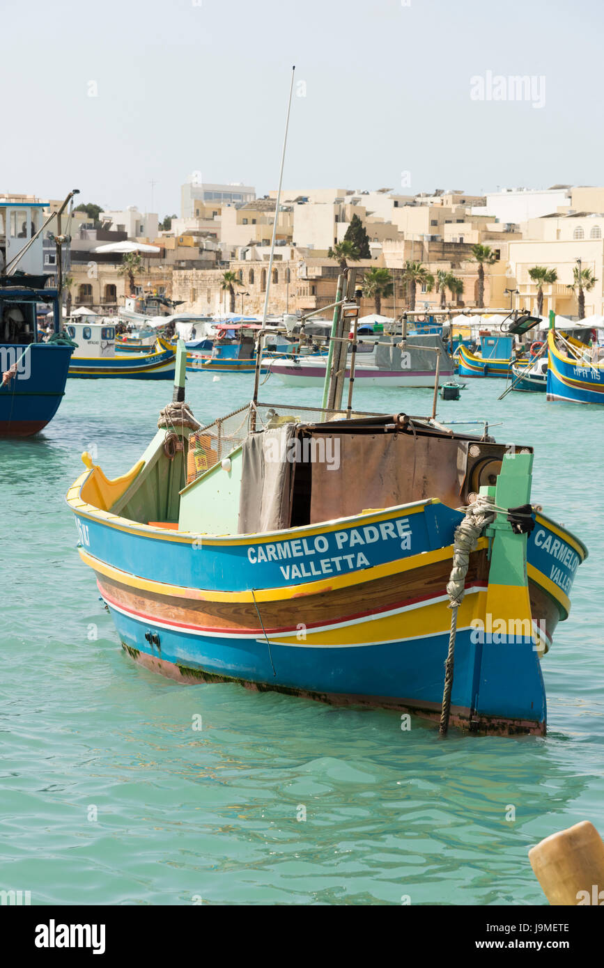 The Carmelo Padre a traditional Maltese fishing boat or luzzu, brightly ...