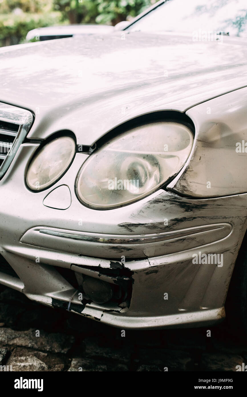 Broken Bumper Luxury Car Scratched With Deep Damage To Paint. Abandoned ...