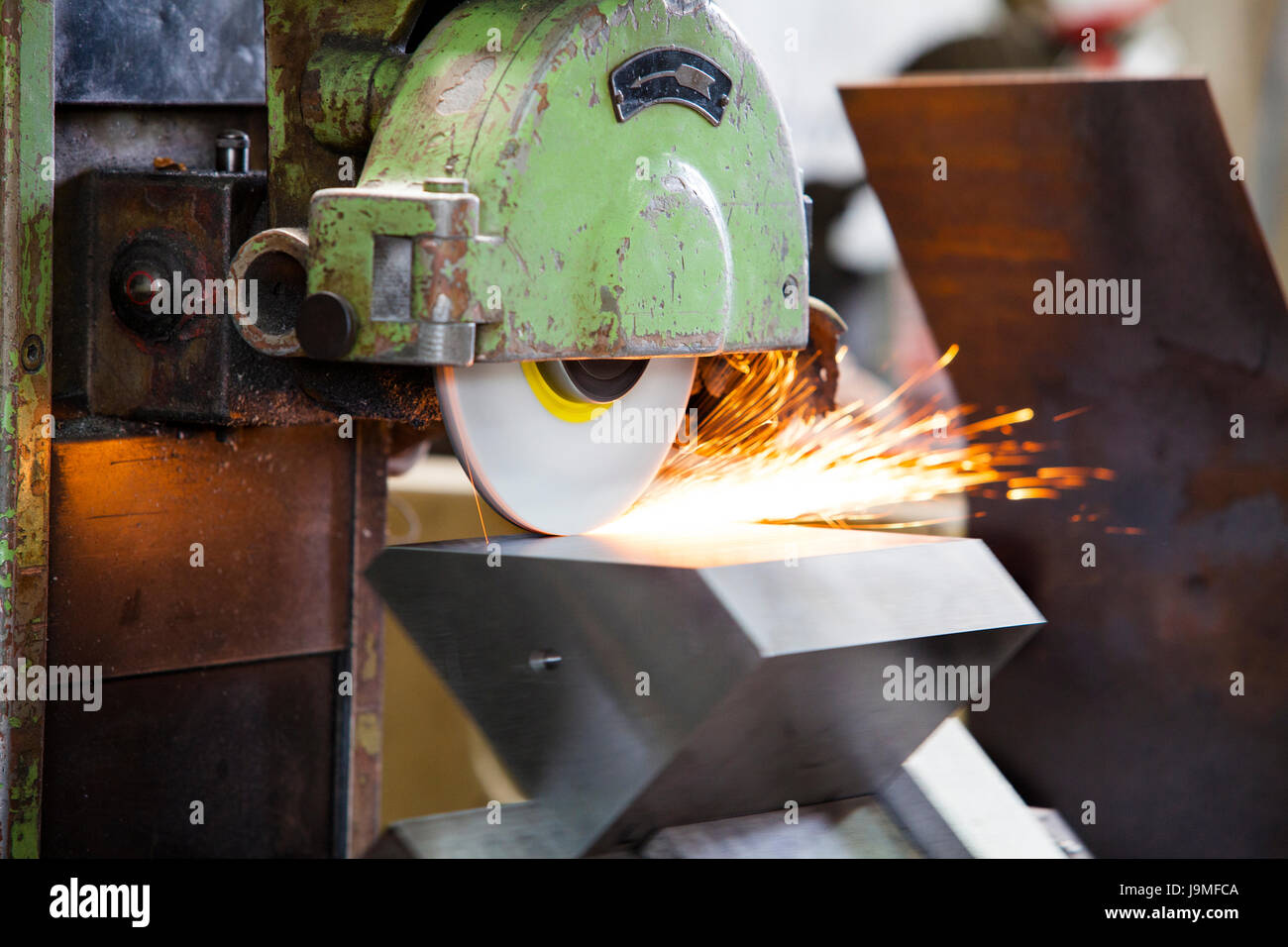metalworking industry. finishing metal surface on horizontal grinder ...